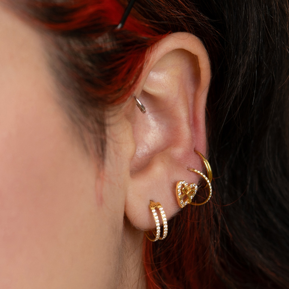 Uluitor cercel dublu din titan cu pietre transparente