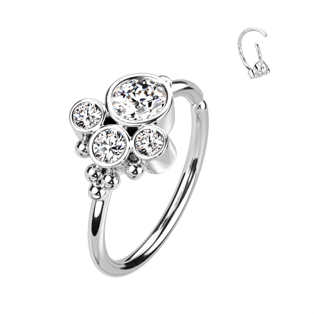 Grup de pietre rotunde într-un cercel răsucit